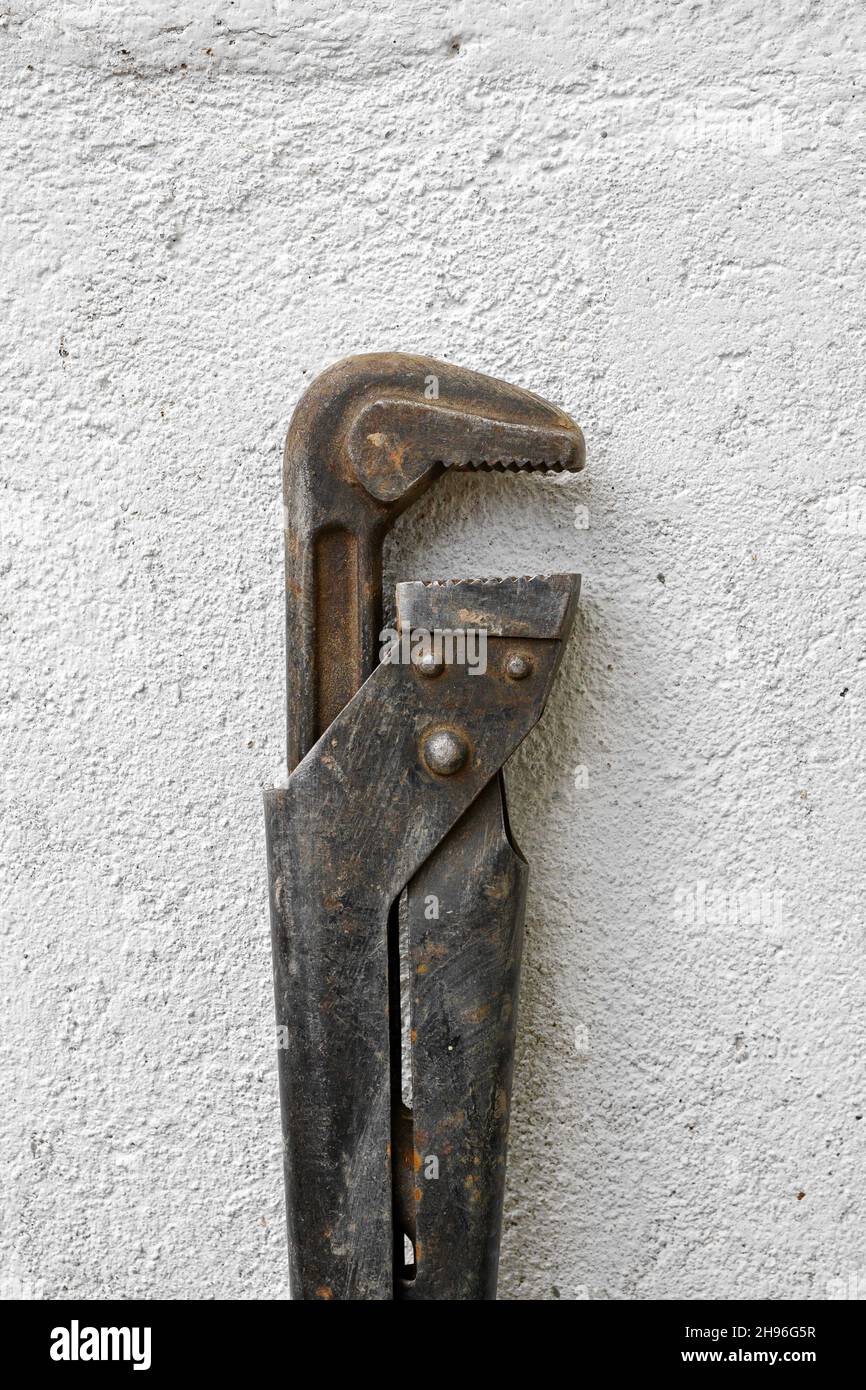 Old vintage rusty pipe wrench Stock Photo - Alamy