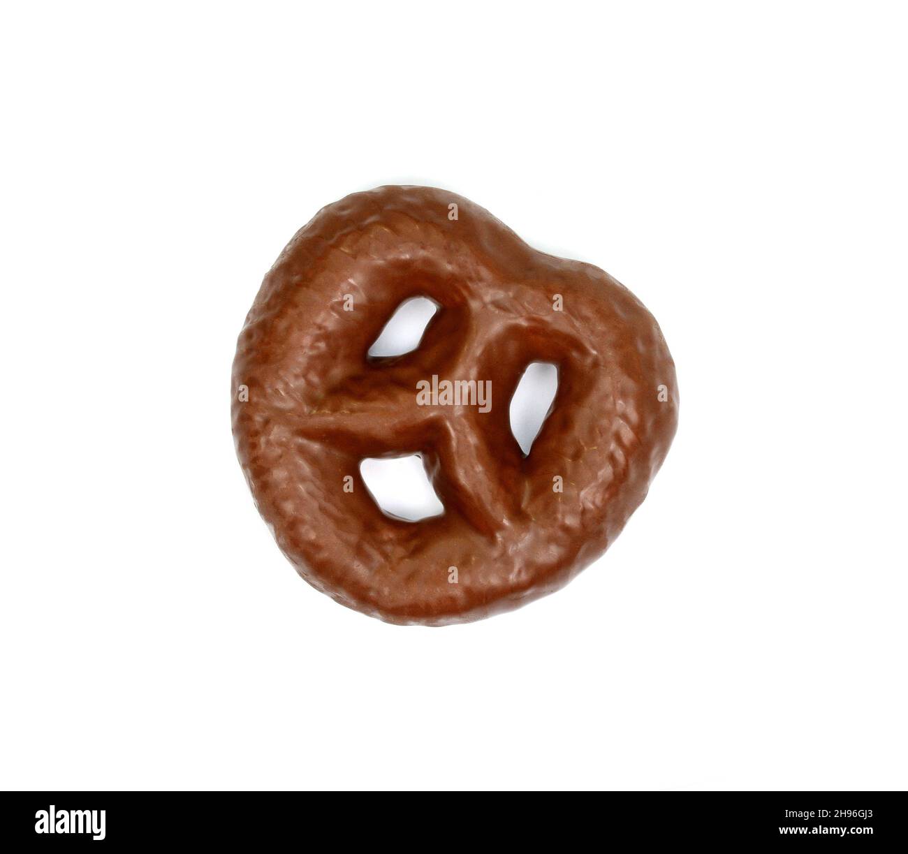 Chocolate honey cake isolated on white background. Pretzel shape cake ...