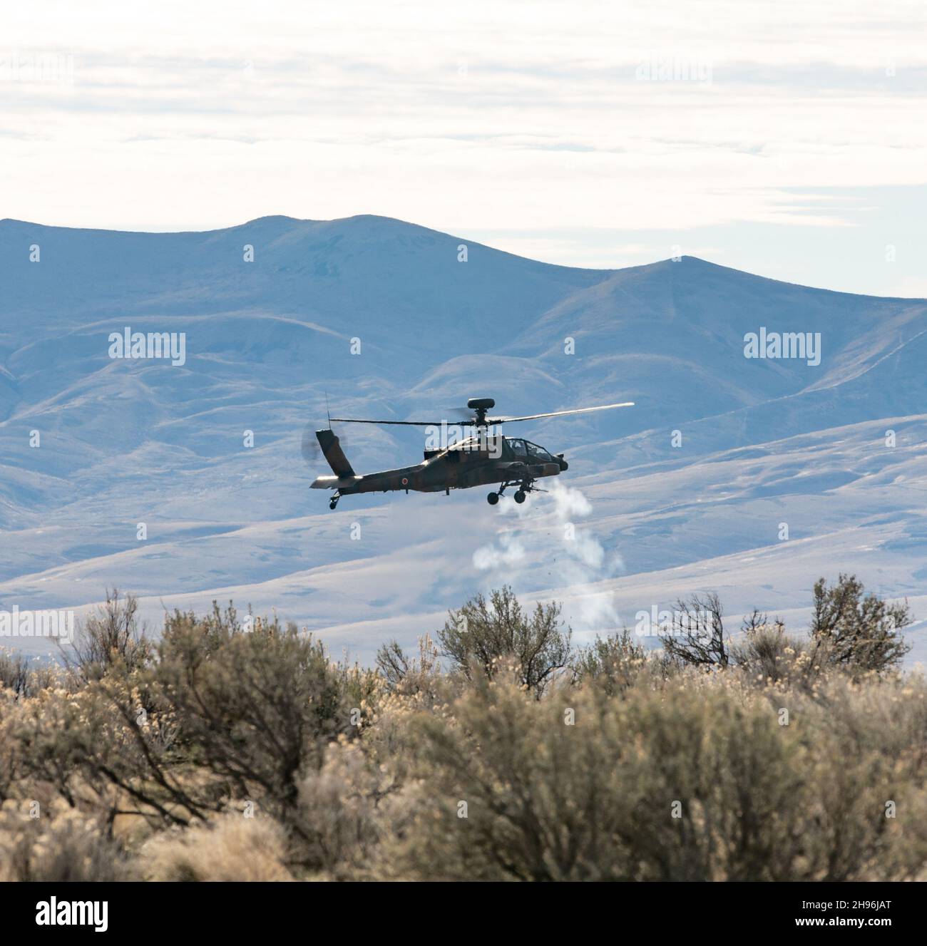 Apache Helicopter Firing Guns