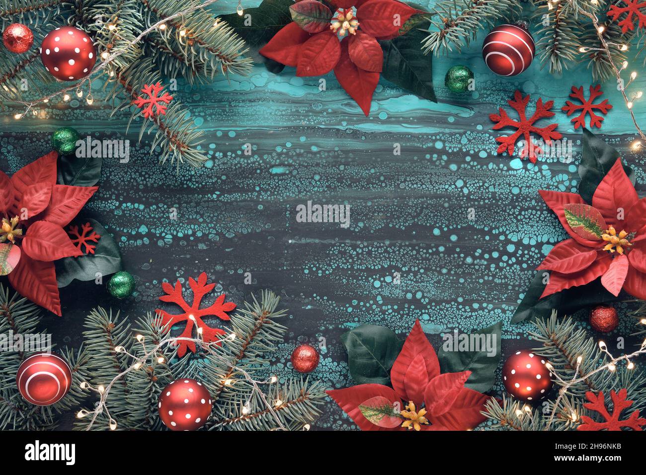 Cyan red Christmas background with poinsettia, fir twigs, glass balls ...