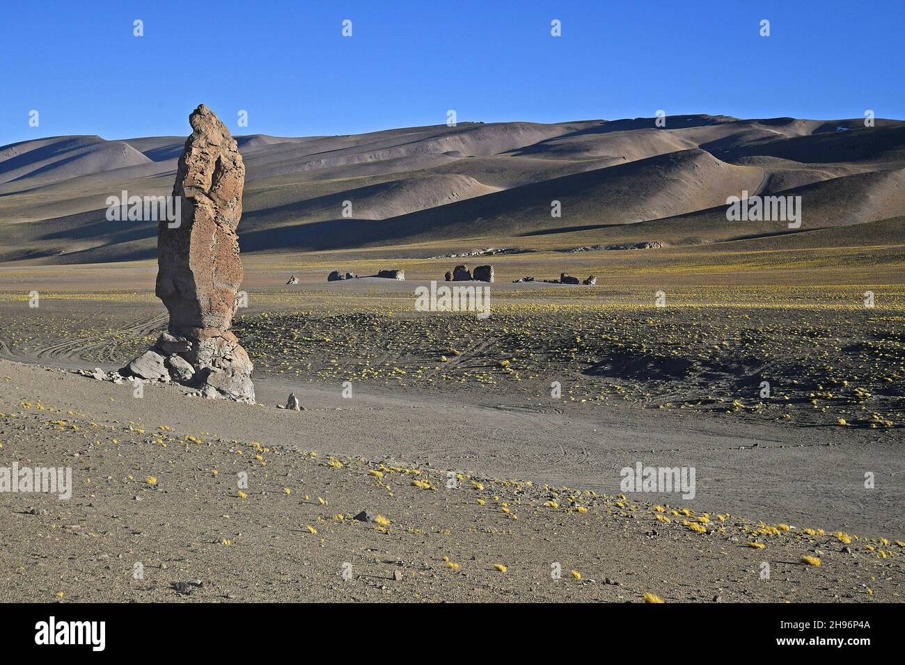 Geological monolith (Monjes de la Pakana) and dry hil in the Atacama ...