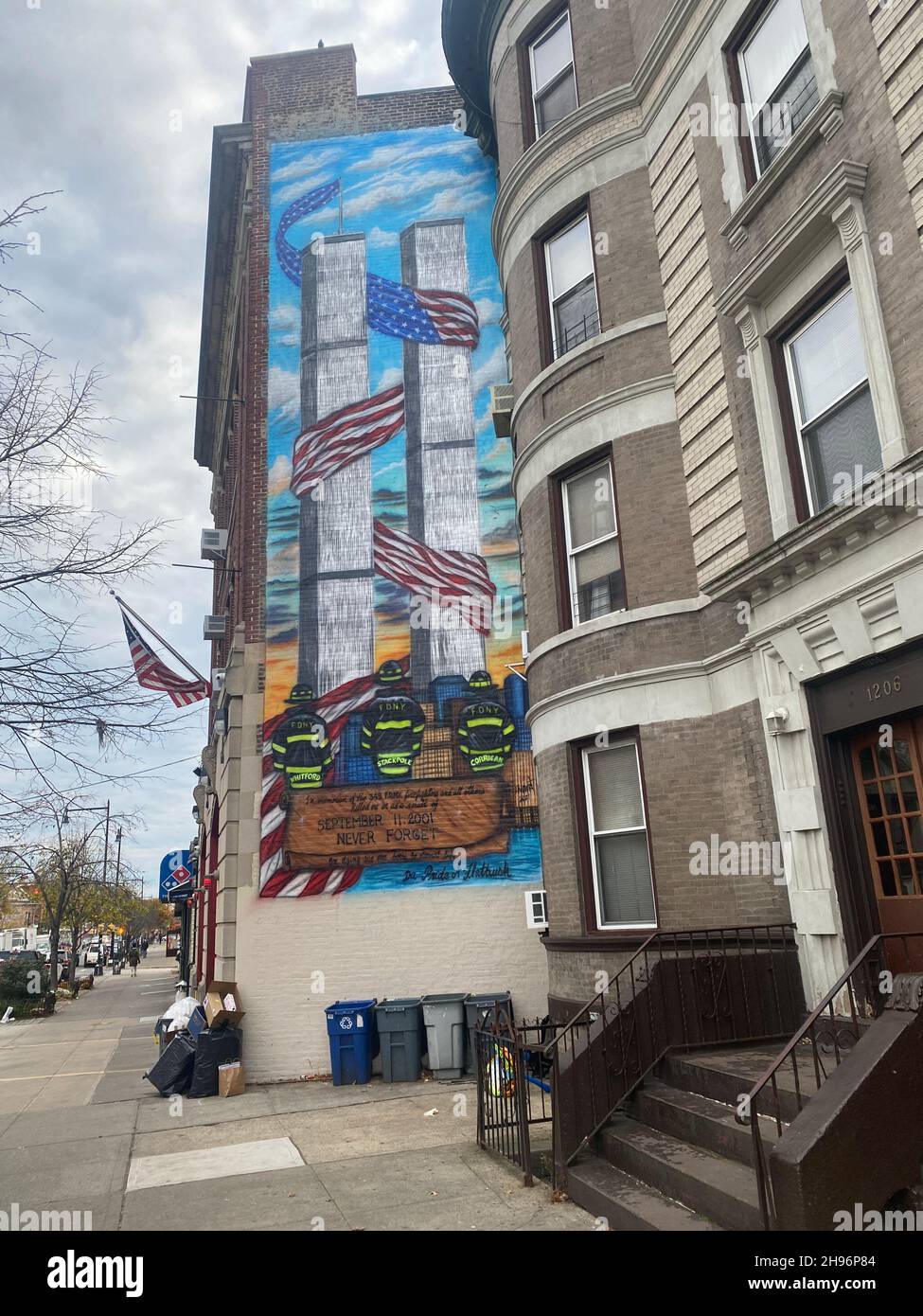 FDNY memorial mural on the side of a firehouse, remembering firemen who ...