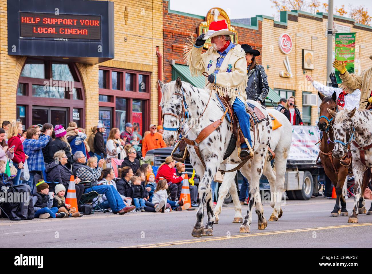 Oklahoma, DEC 4, 2021 - Cowboy and cowgirl riding horse in Cowboy ...