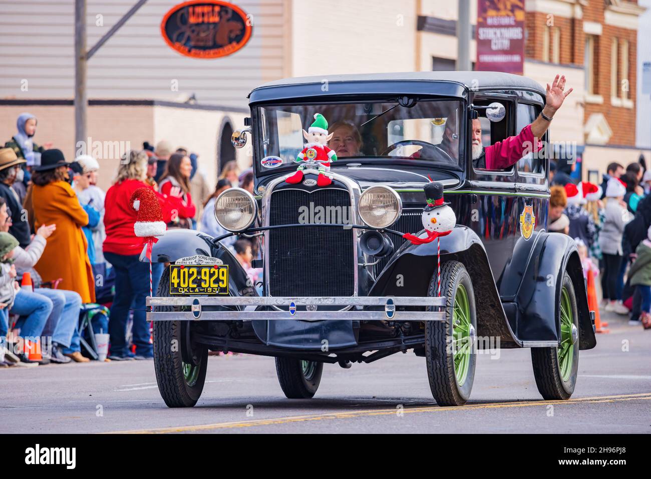 Oklahoma, DEC 4, 2021 - Antique car driving in Cowboy Christmas Parade ...
