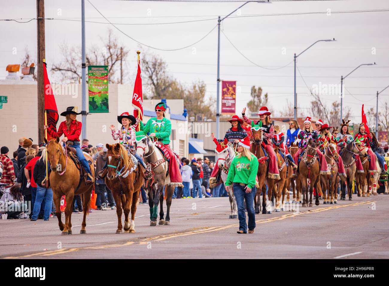Oklahoma, DEC 4, 2021 - Cowboy and cowgirl riding horse in Cowboy ...