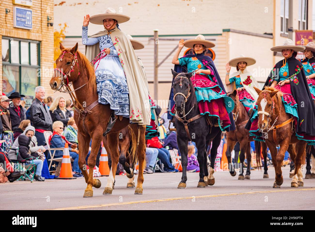 Oklahoma, DEC 4, 2021 - Cowboy and cowgirl riding horse in Cowboy ...