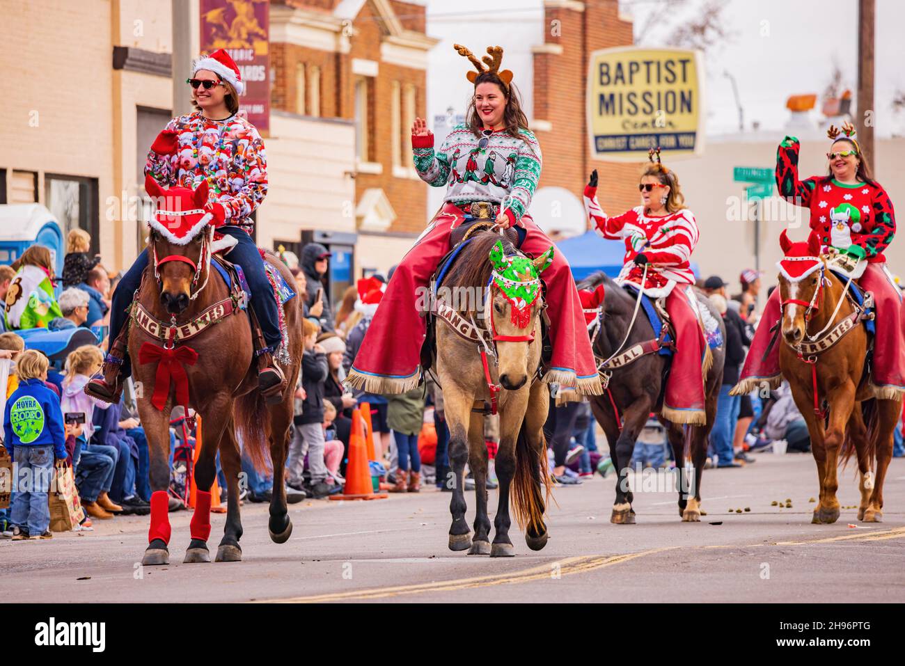 Oklahoma, DEC 4, 2021 - Cowboy and cowgirl riding horse in Cowboy ...