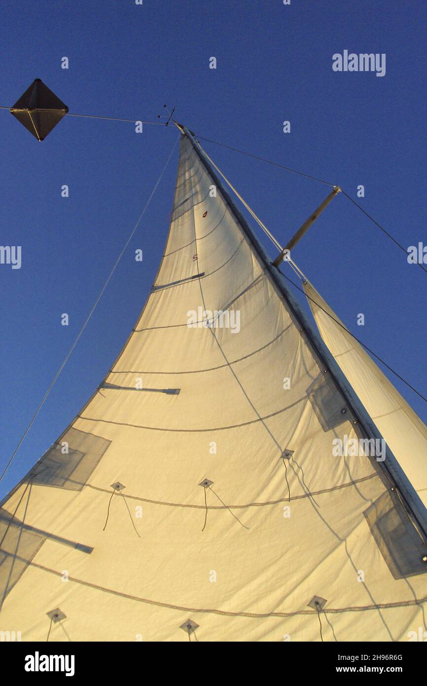 Vertical low angle shot of the big tall sail of a boat Stock Photo - Alamy