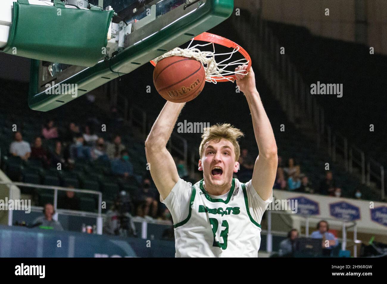 Athens, Ohio, USA. 4th Dec, 2021. Ohio forward A.J. Clayton (23) dunks ...