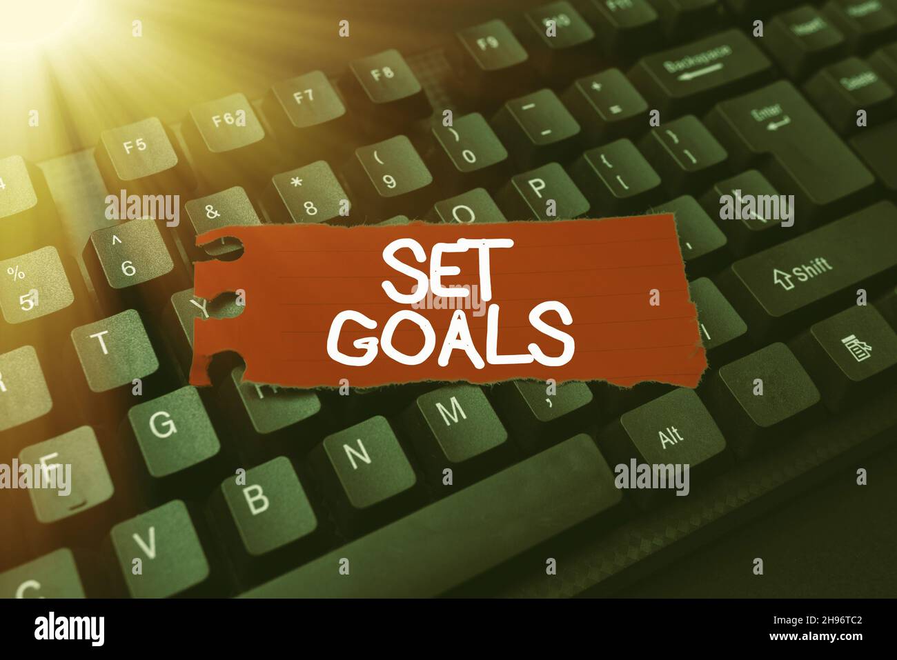 Hand writing sign Set Goals. Word for Defining or achieving something ...