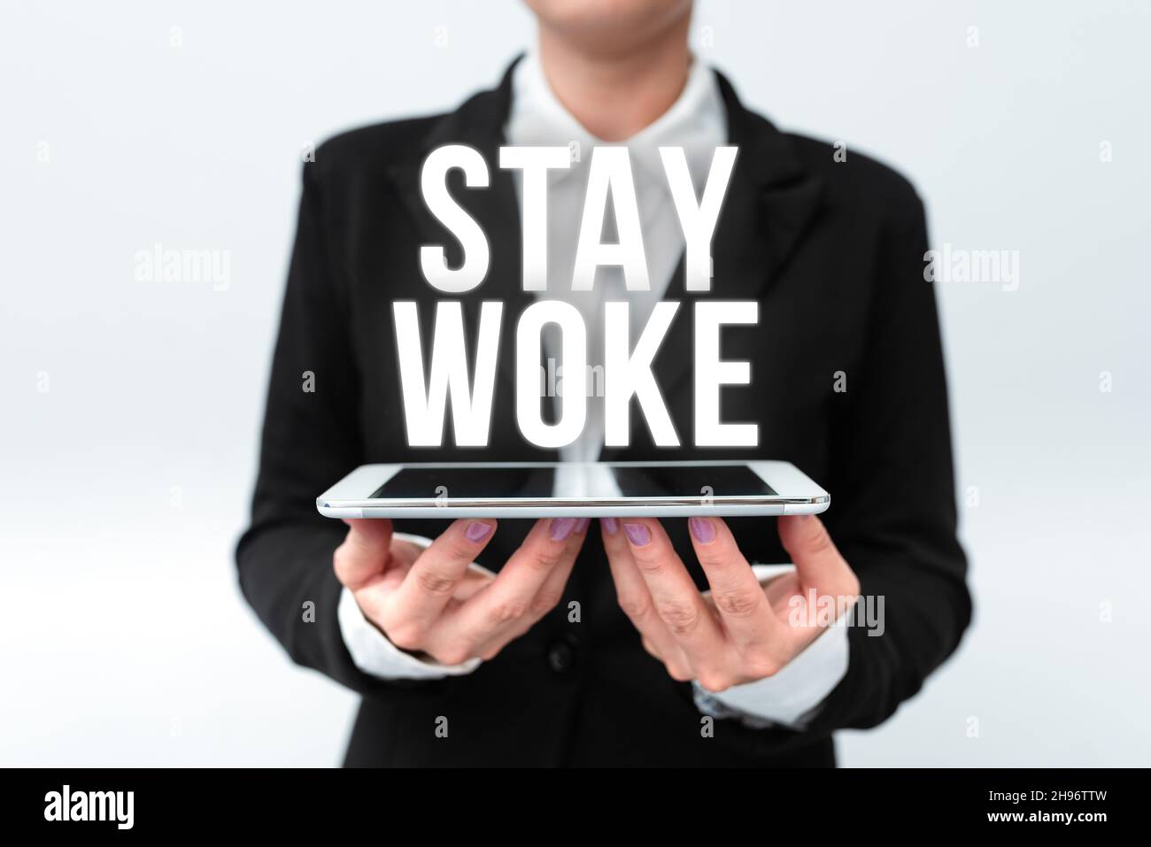 Hand writing sign Stay Woke. Concept meaning being aware of your ...