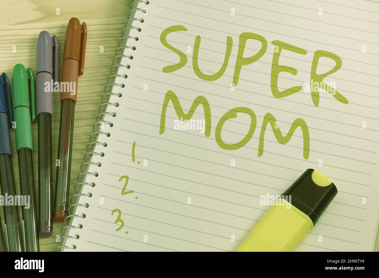 Hand writing sign Super Mom. Business showcase a mother who can combine ...