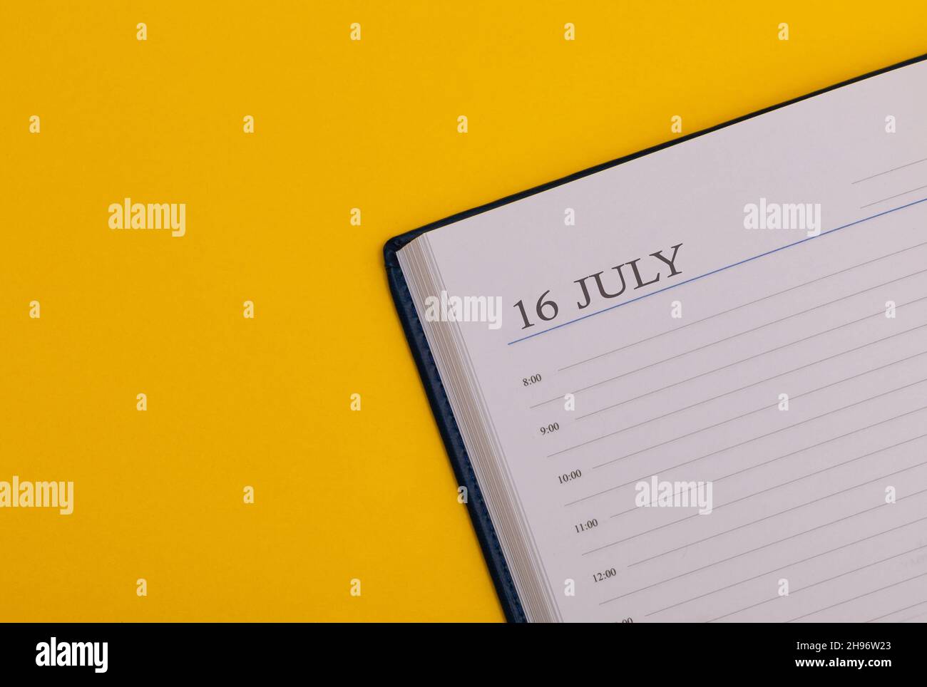Notepad or diary with the exact date on a yellow background. Calendar ...
