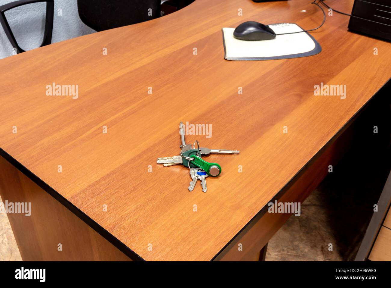 large bunch of different keys with an electronic key lies on the ...