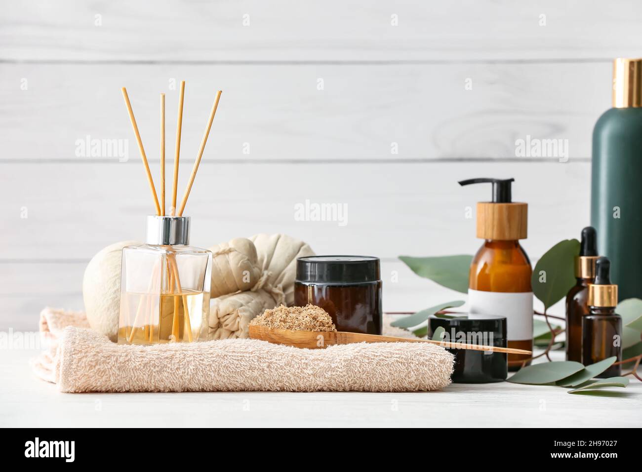 Spa set with aroma diffuser on light background Stock Photo - Alamy