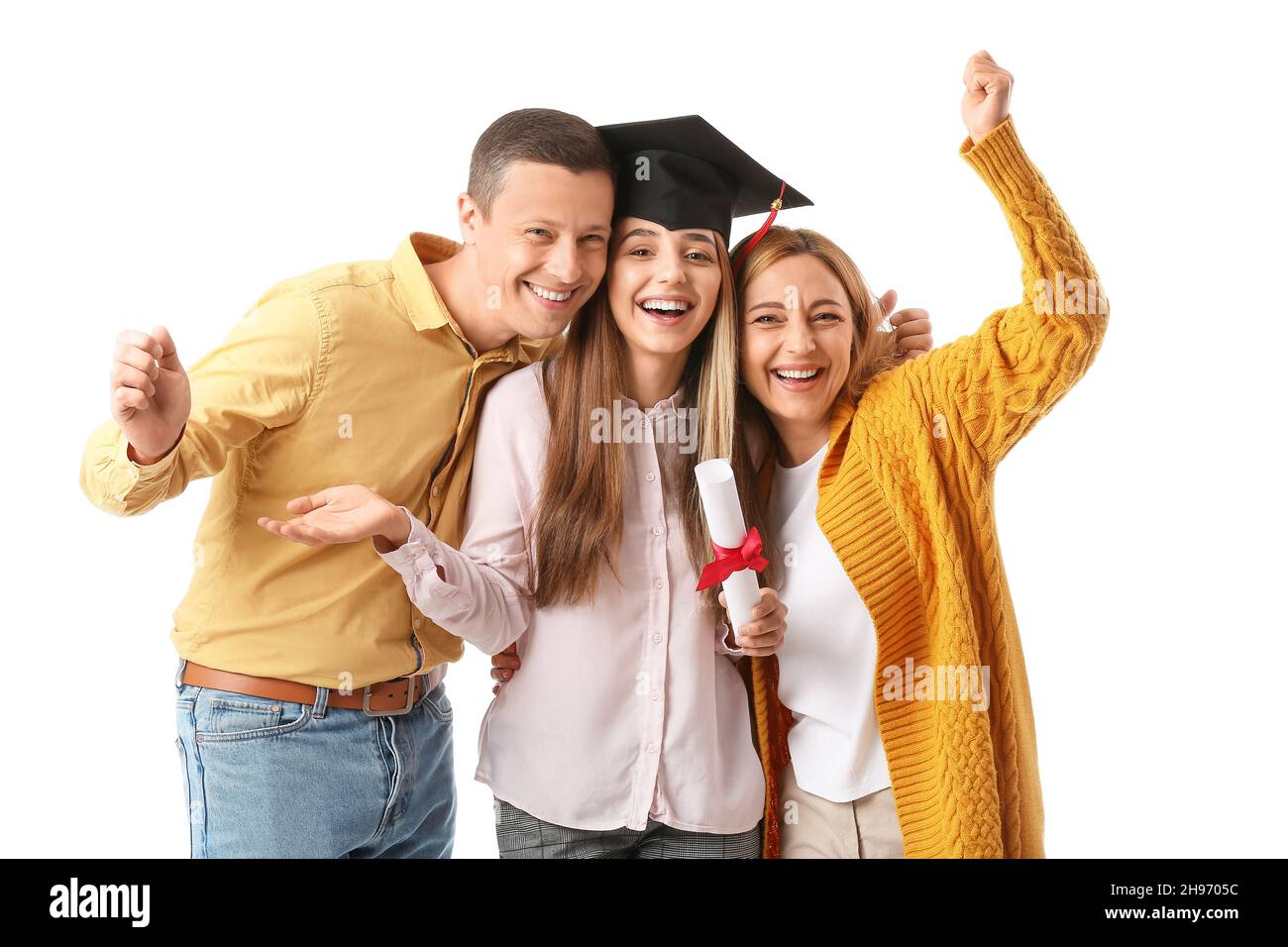 Happy female graduation student with her parents on white background ...