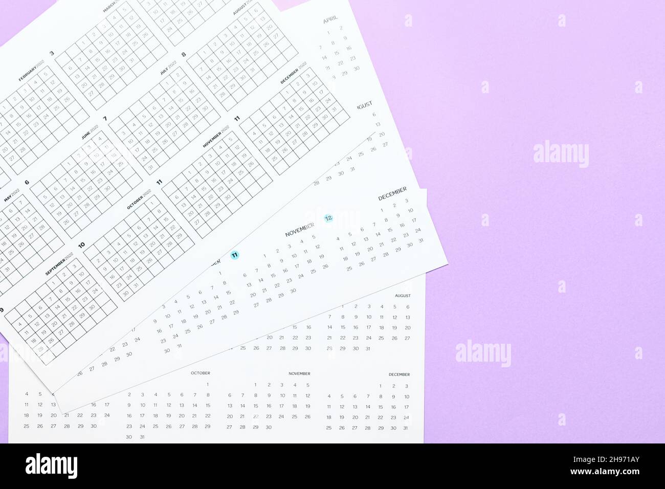 Classic calendars for 2022 year on color background, closeup Stock ...