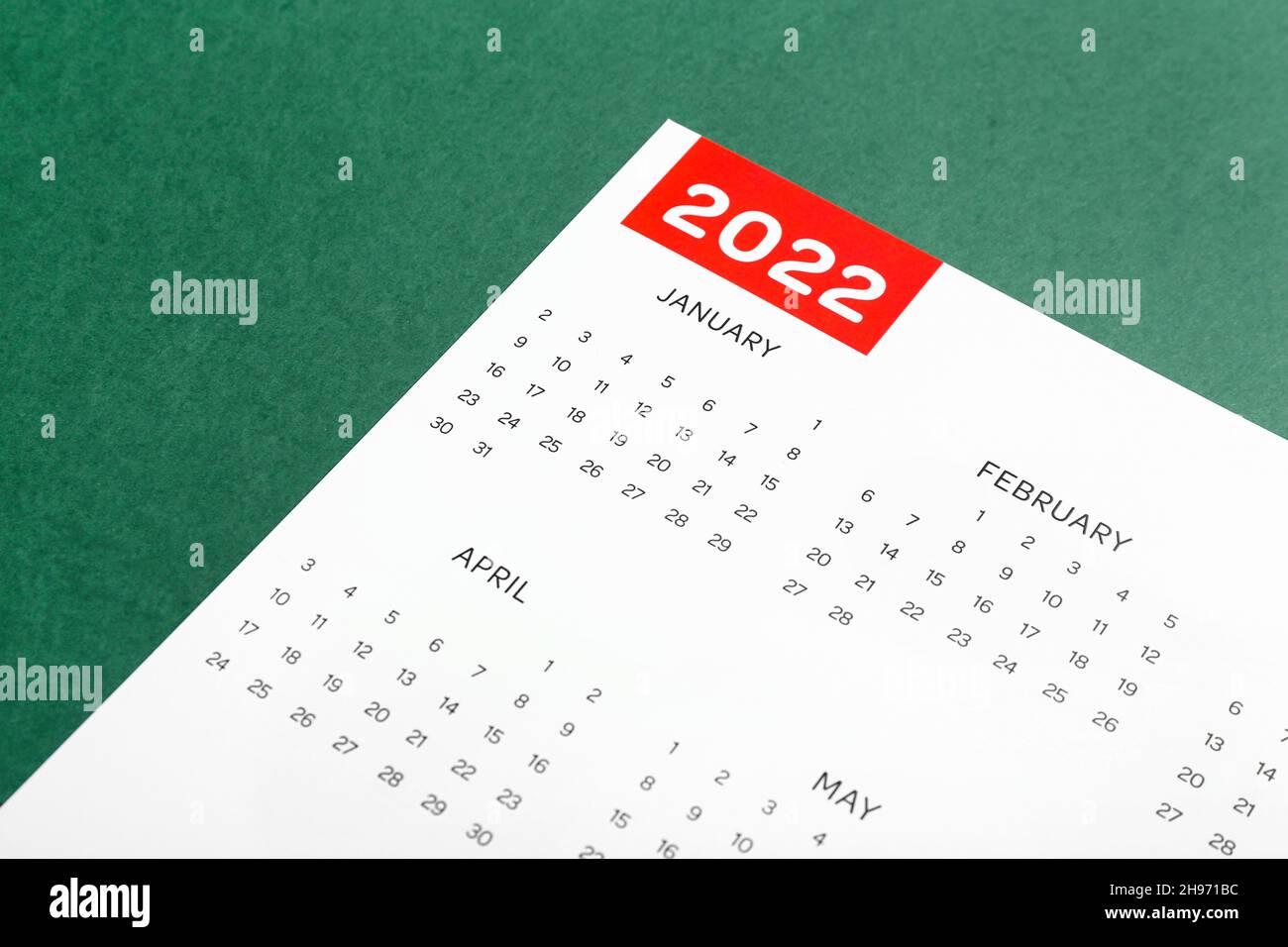 Classic paper calendar 2022 year on green background, closeup Stock ...