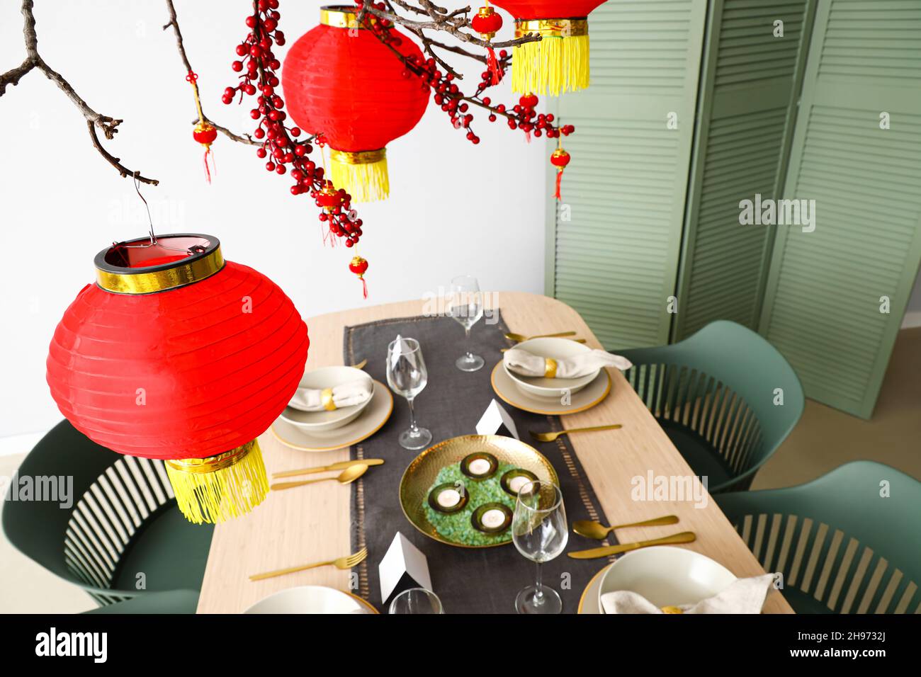 Beautiful table setting for Chinese New Year celebration in room Stock ...