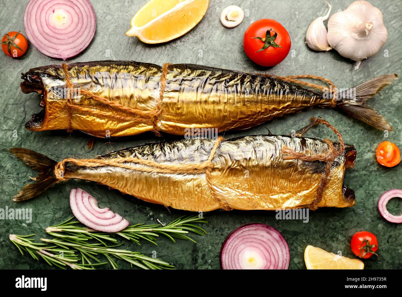 Tasty smoked mackerel on color background Stock Photo - Alamy