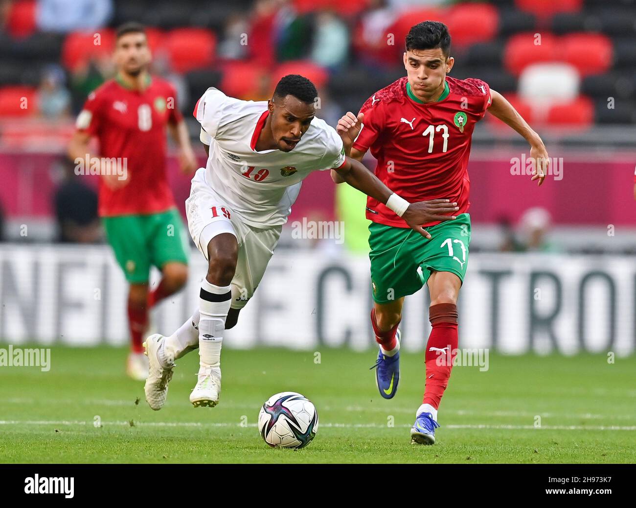 Al Rayyan, Qatar. 4th Dec, 2021. El Haddad Ismail (R) of Morocco vies ...
