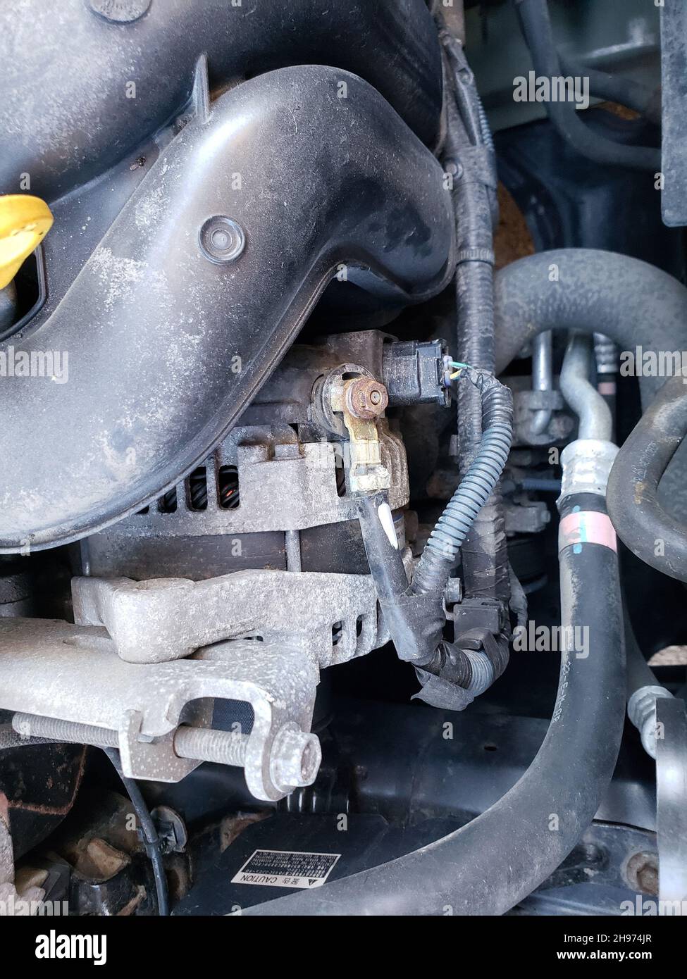 Old Alternator seen inside an engine of a Toyota Corolla Stock Photo ...