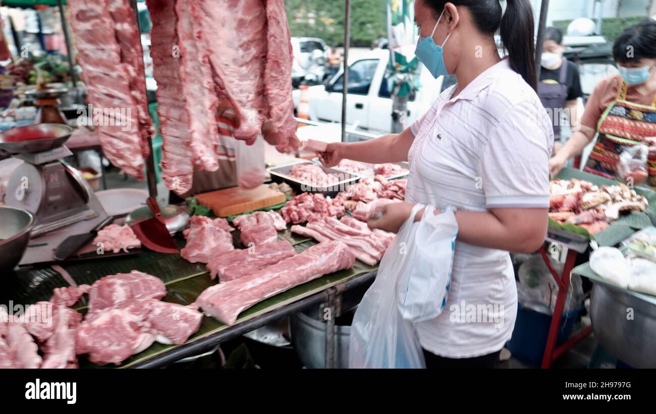 Purchasing meat hi-res stock photography and images - Alamy