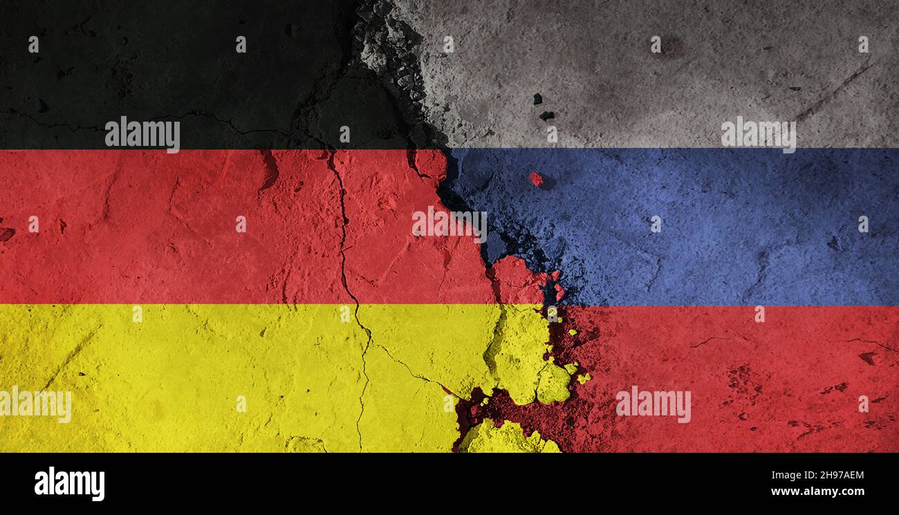 Germany vs russia flag on a rough background. Broken and cracked ...