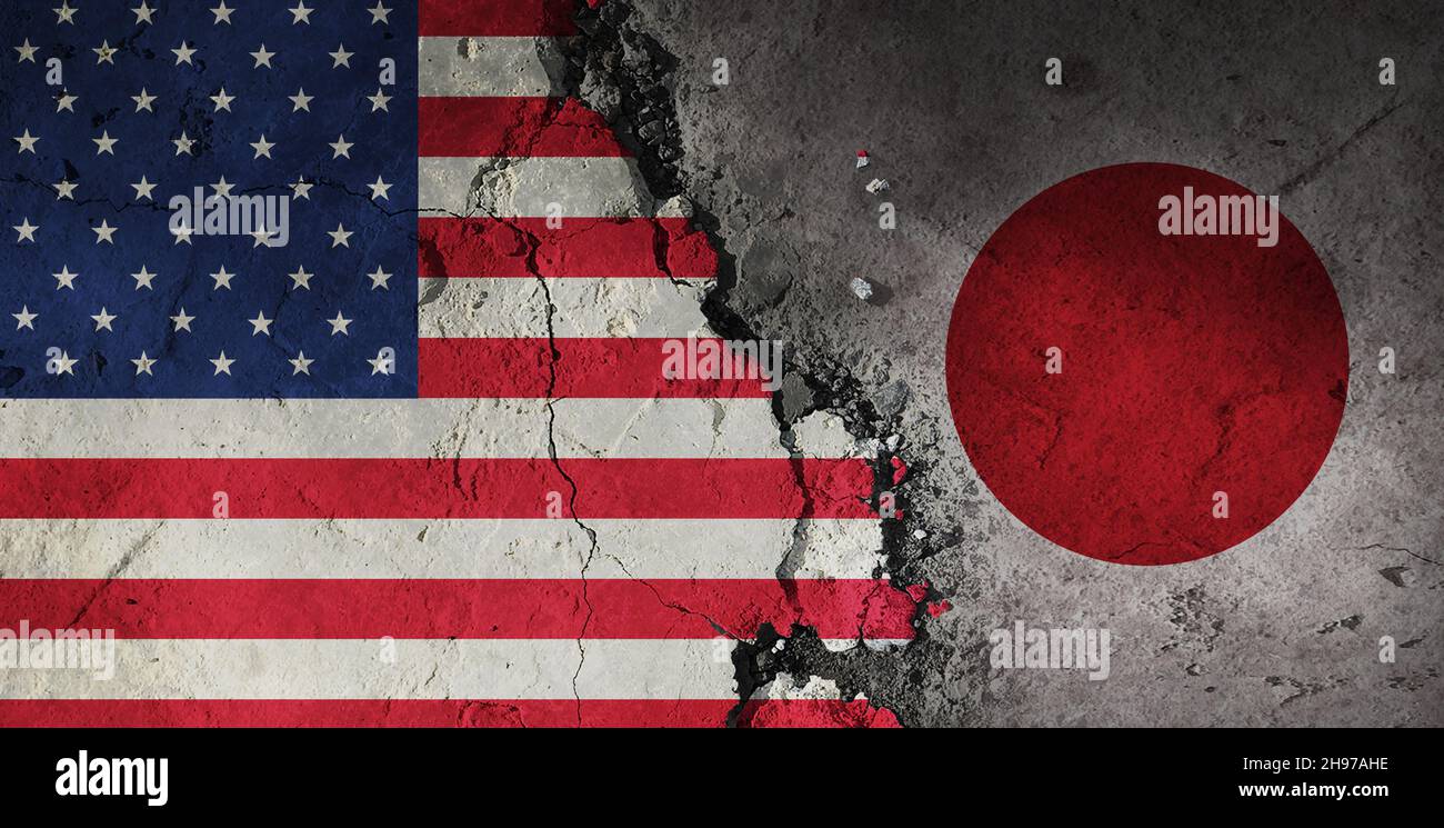 US vs Japan flag on a rough background. Broken and cracked background ...