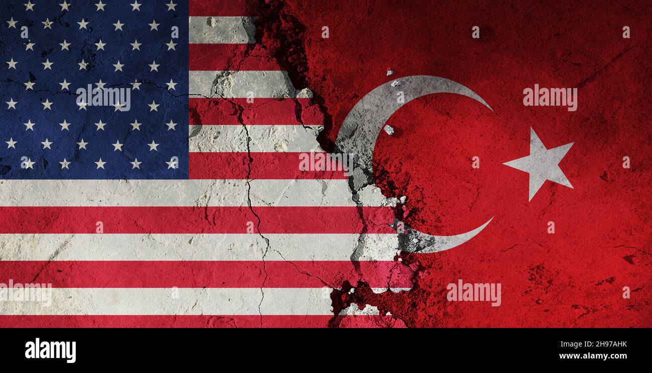 US vs turkey flag on a rough background. Broken and cracked background ...