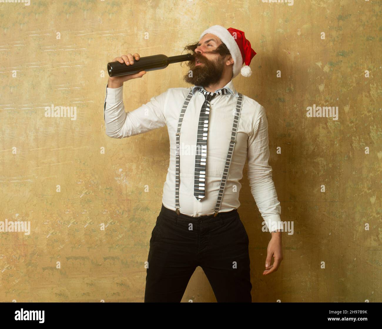 Bad drunk santa. Christmas man with beard at home alone. Winter holiday ...