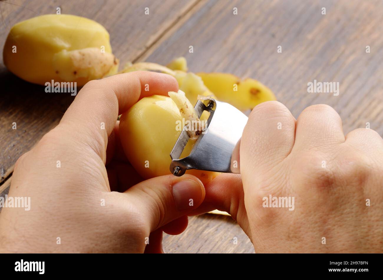 Potato peelings and knife on table hi-res stock photography and images ...