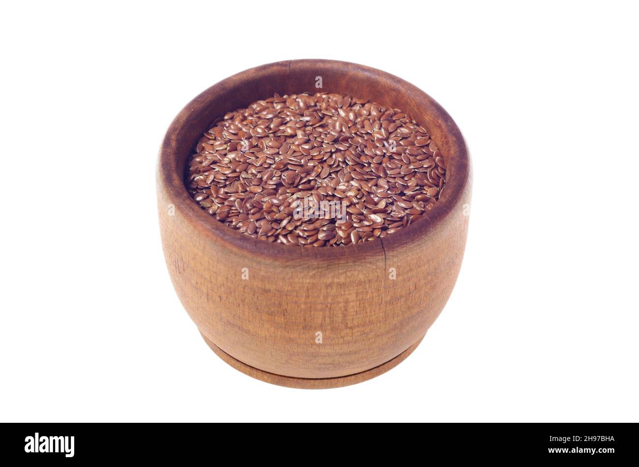 Brown flax seeds in wooden bowl isolated on white background Stock Photo - Alamy