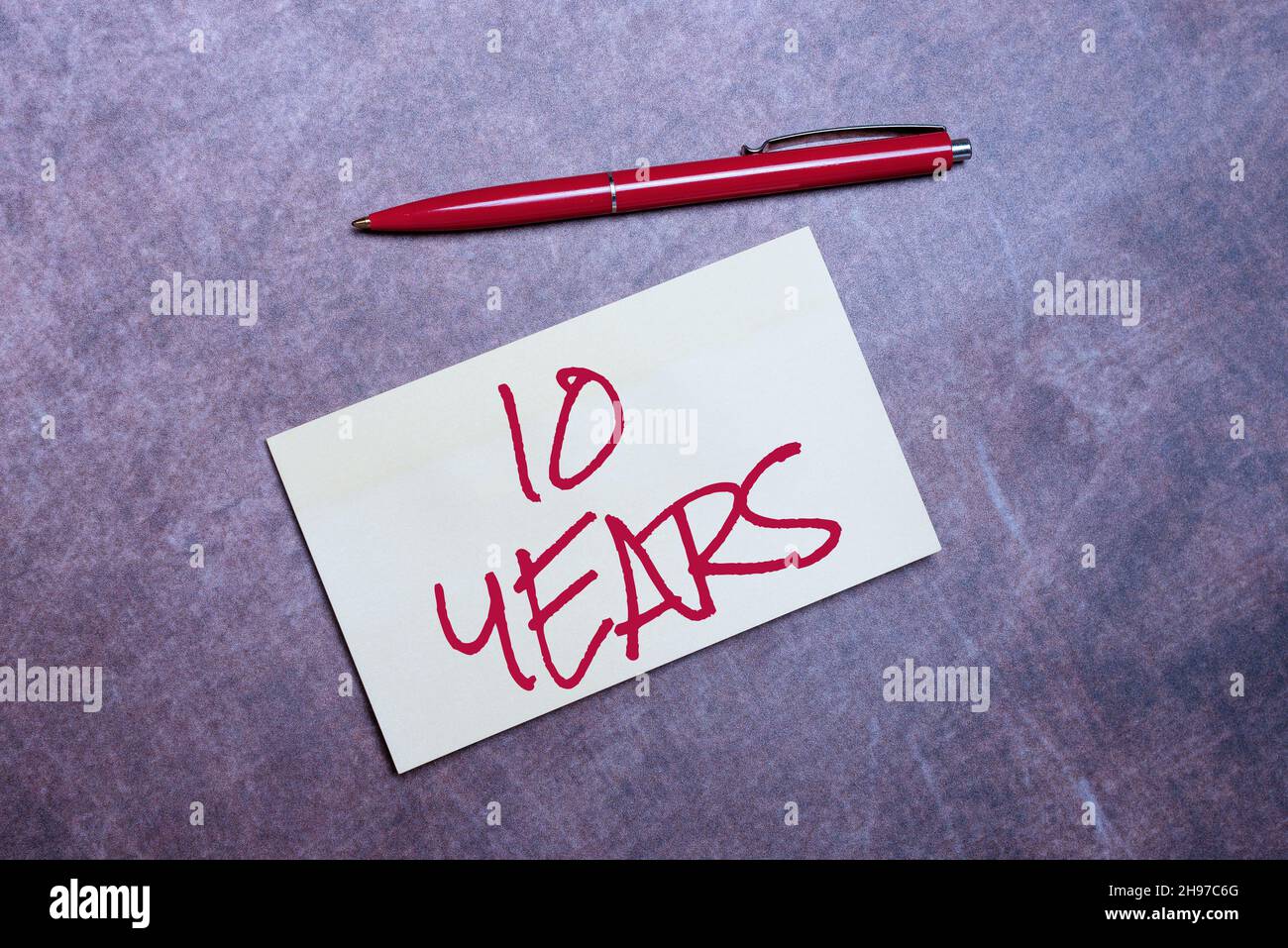 Writing displaying text 10 Years. Concept meaning Remembering or ...