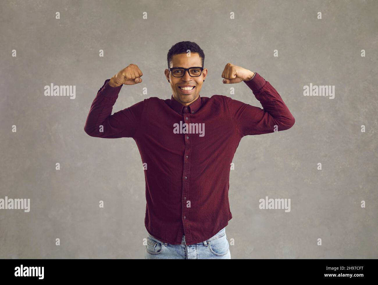 African american man showing strength and power with hands studio shot ...