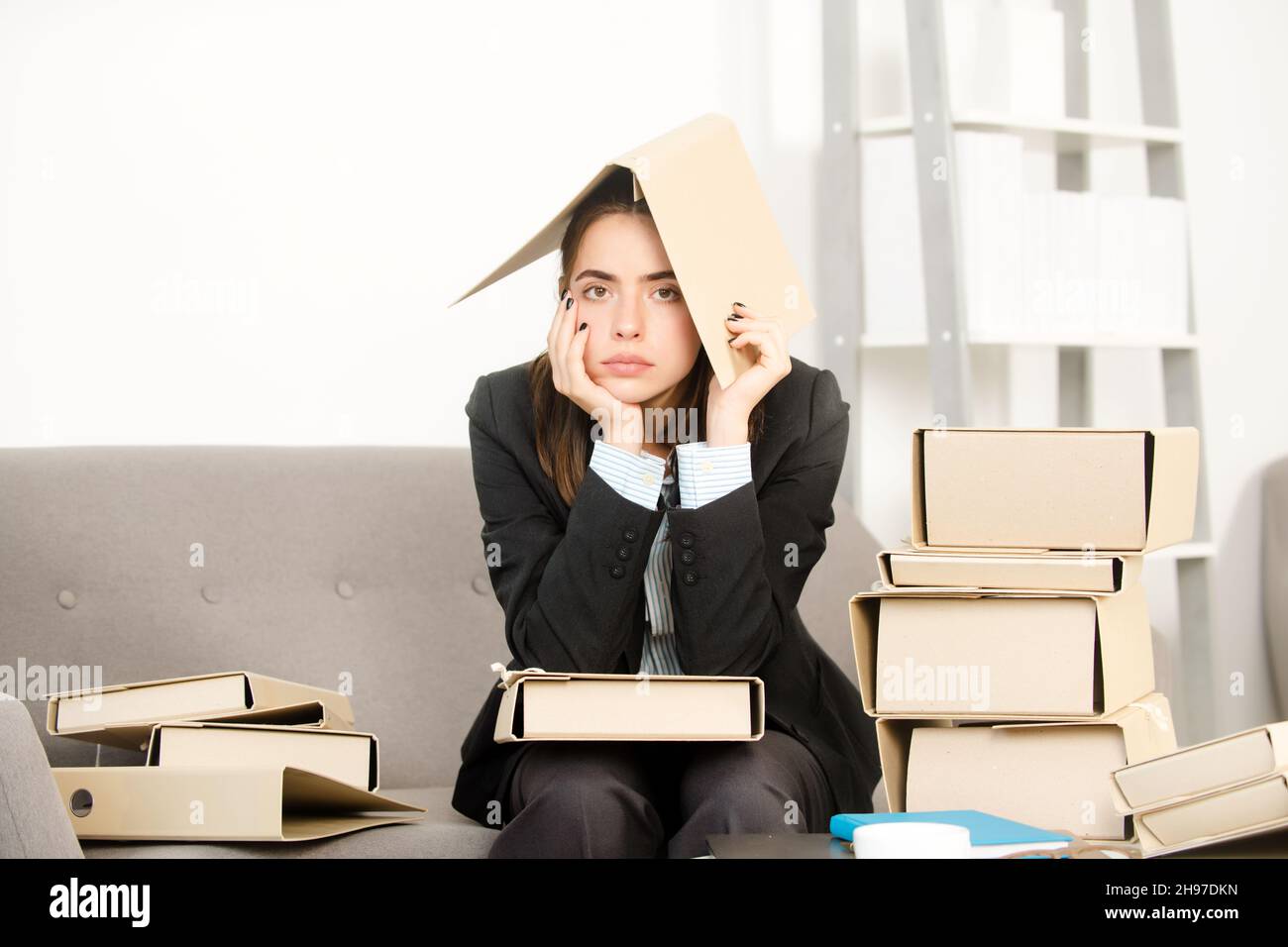 Busy business woman, secretary girl working alone late in office. Angry ...