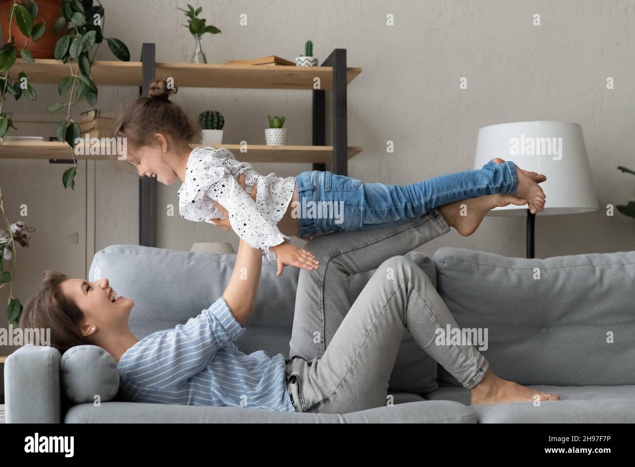 Kid lifting kid hi-res stock photography and images - Alamy