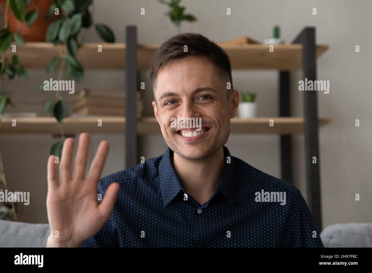 Smiling business man making video hi-res stock photography and images ...