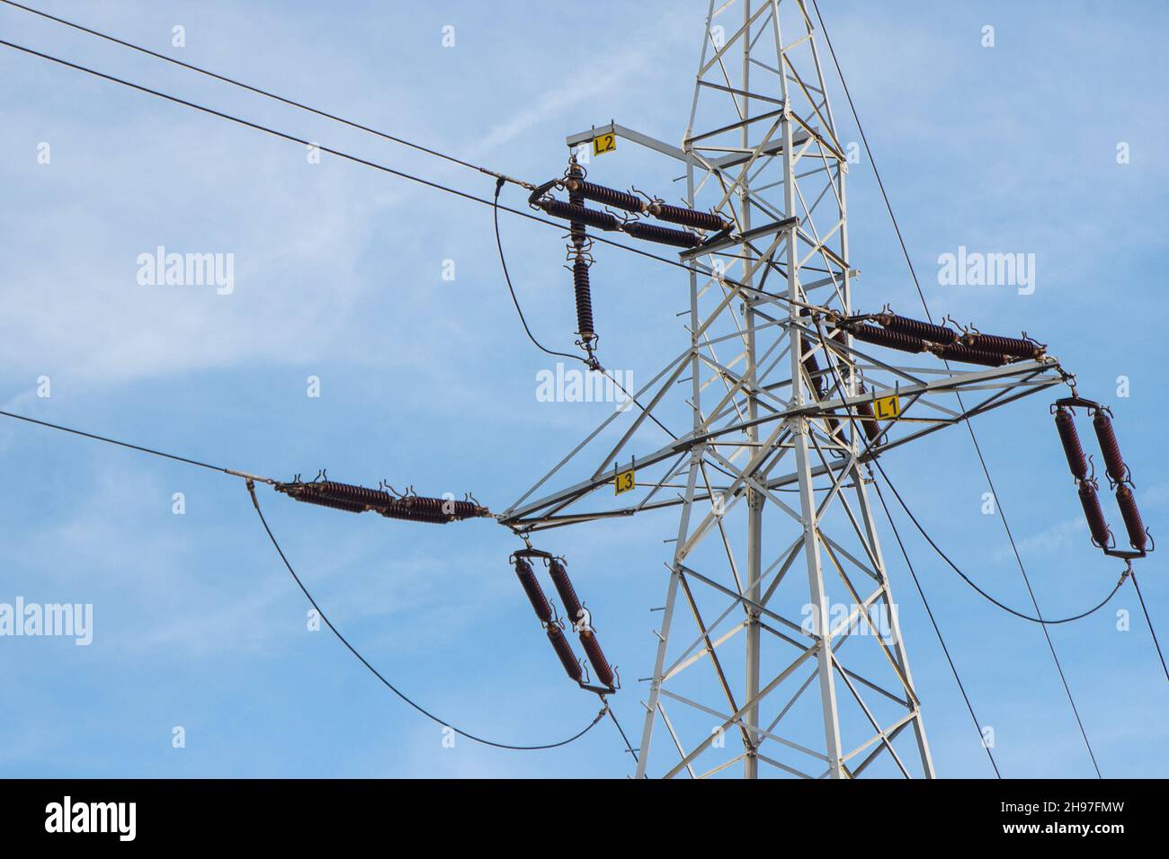High voltage electric pole with wires. Line of electricity ...