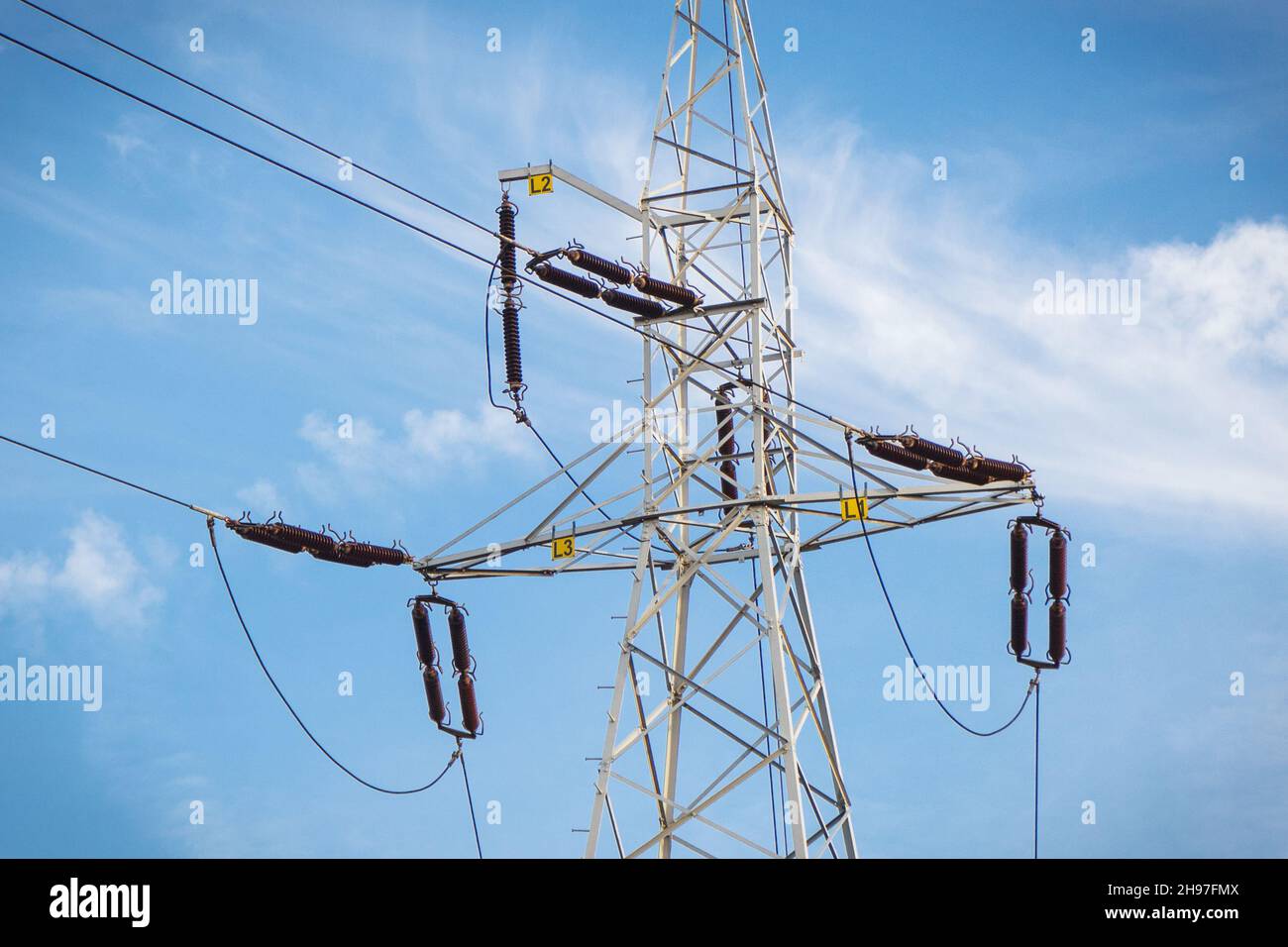 High voltage electric pole with wires. Line of electricity ...