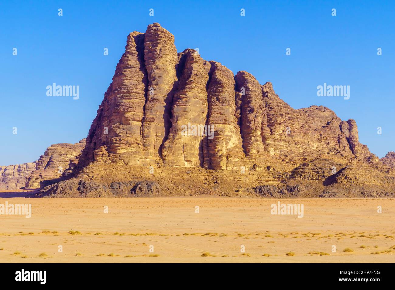 View of the Seven Pillars of Wisdom rock formation, in Wadi Rum, desert ...