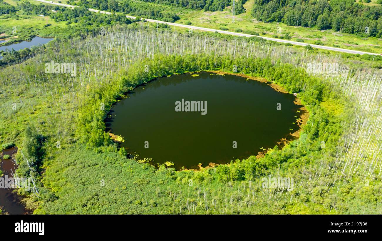 Aerial view of Bottomless Lake in forest of Solnechnogorsk District ...