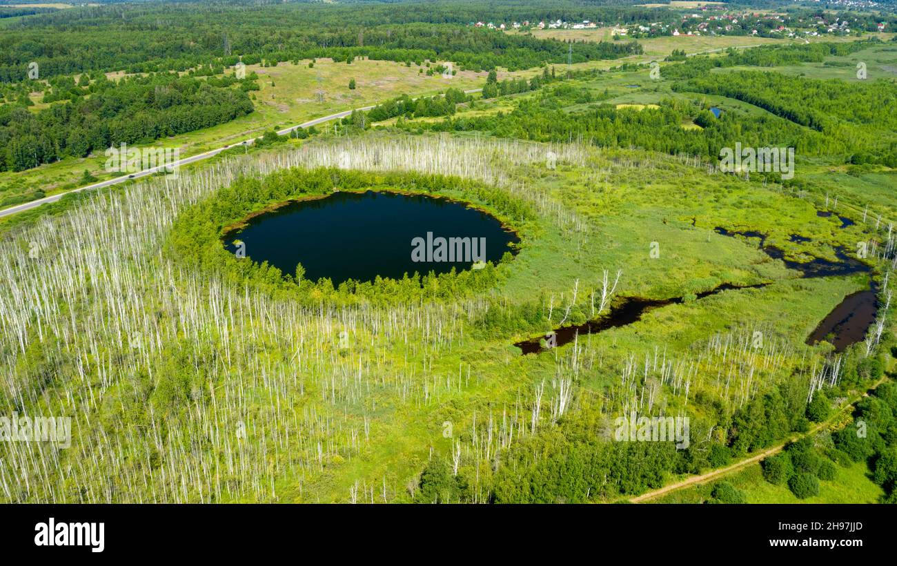 Aerial view of Bottomless Lake in forest of Solnechnogorsk District ...