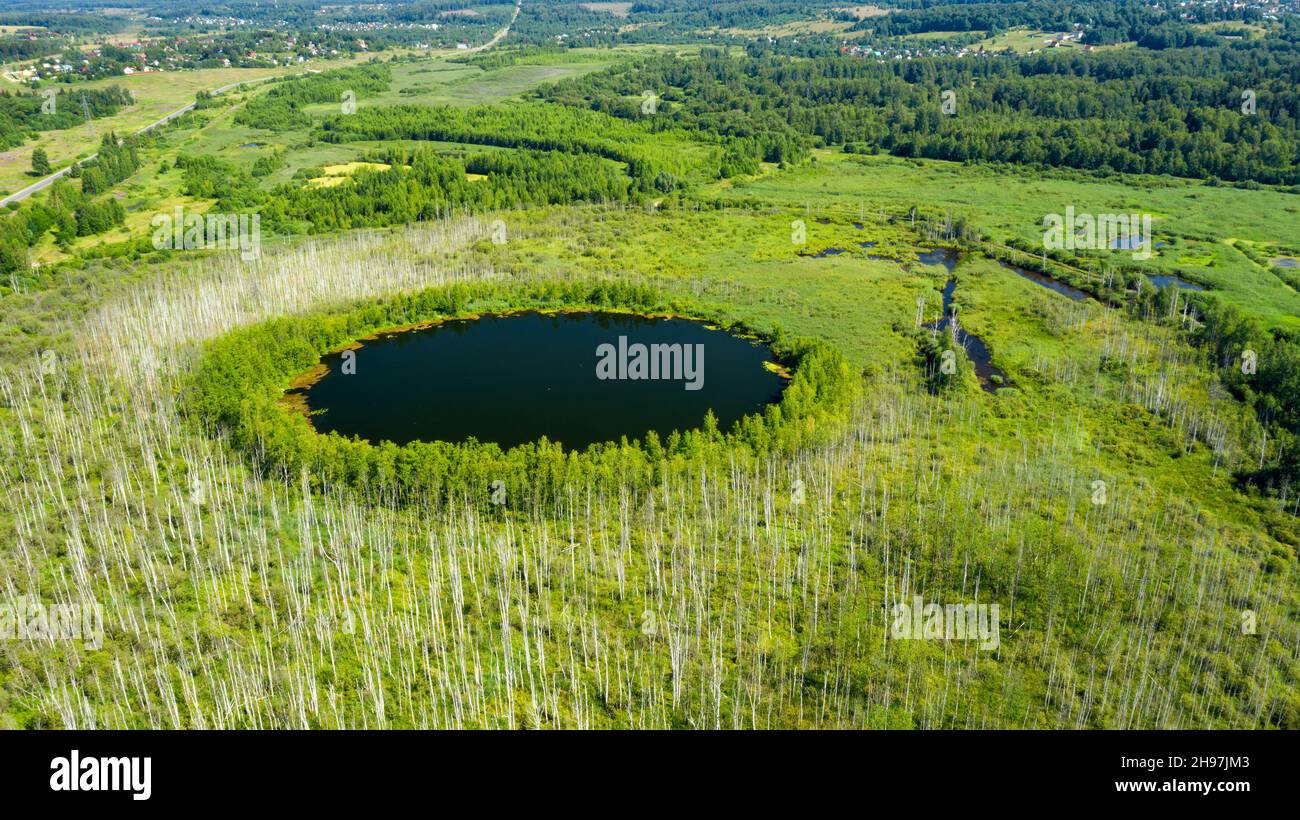 Aerial view of Bottomless Lake in forest of Solnechnogorsk District ...