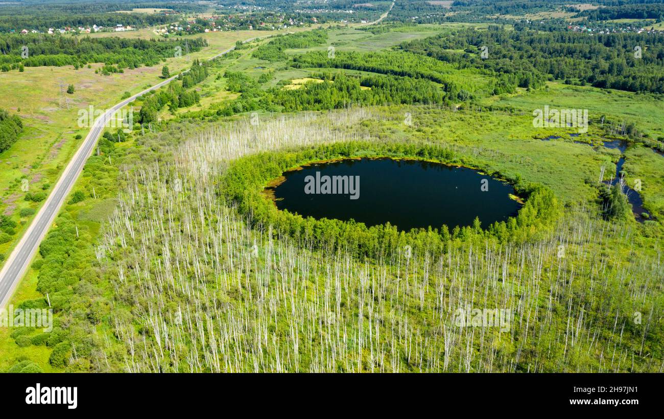 Aerial view of Bottomless Lake in forest of Solnechnogorsk District ...