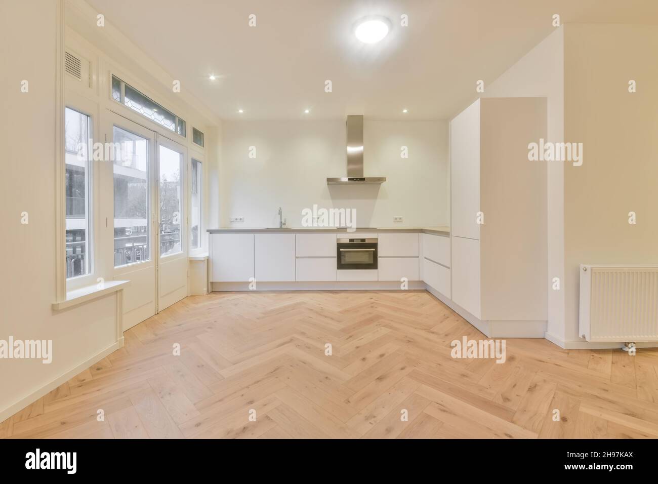 Interior of empty home kitchen with contemporary appliances Stock Photo ...