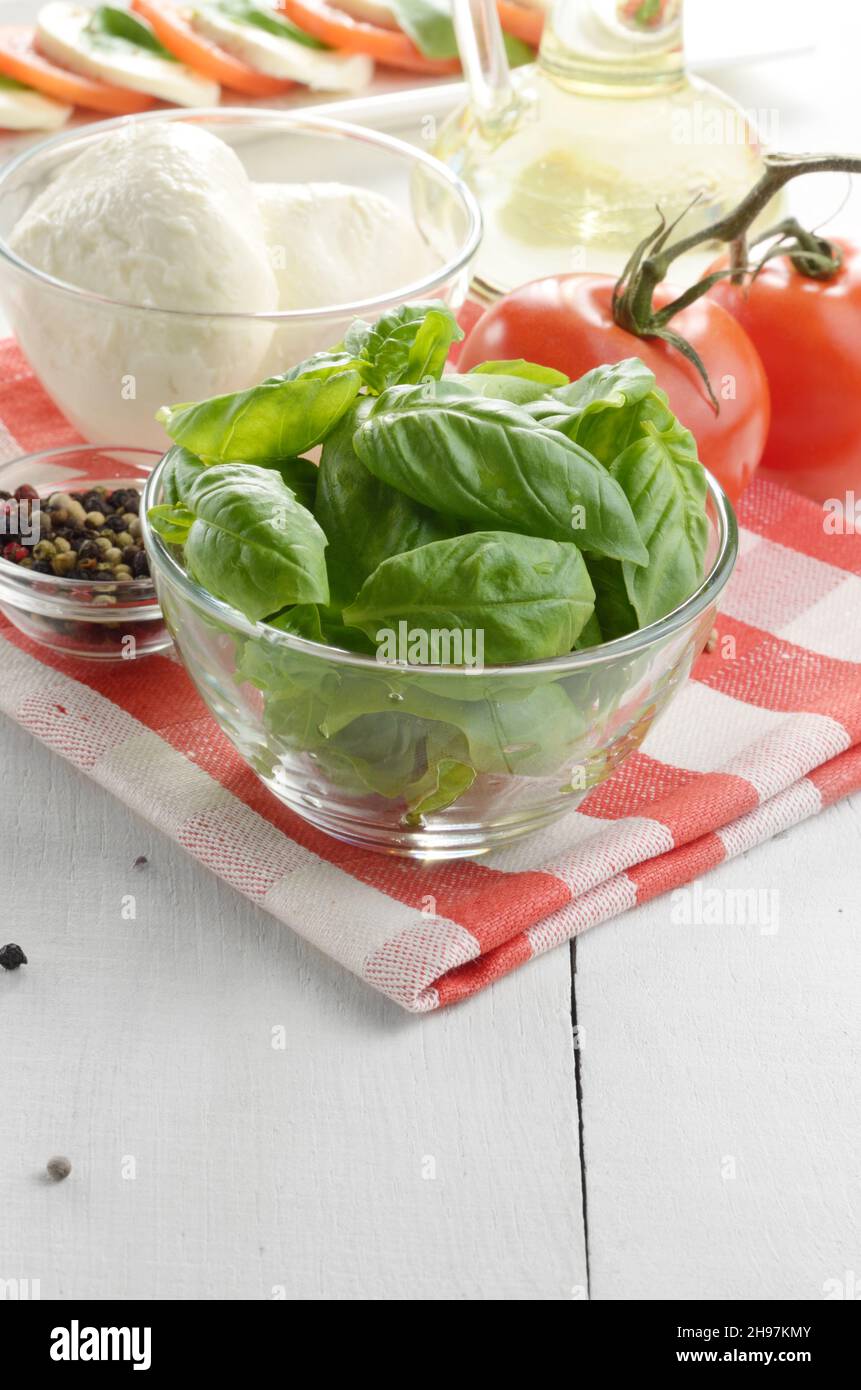 Classic caprese ingredients - mozzarella cheese tomatoes and basil ...