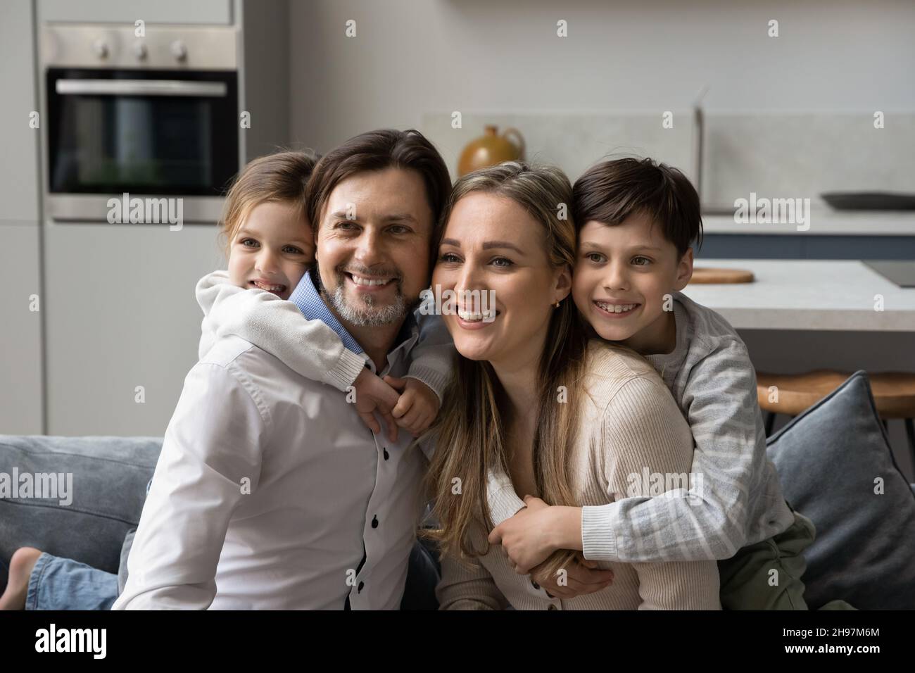 Happy multigenerational family looking in distance Stock Photo - Alamy
