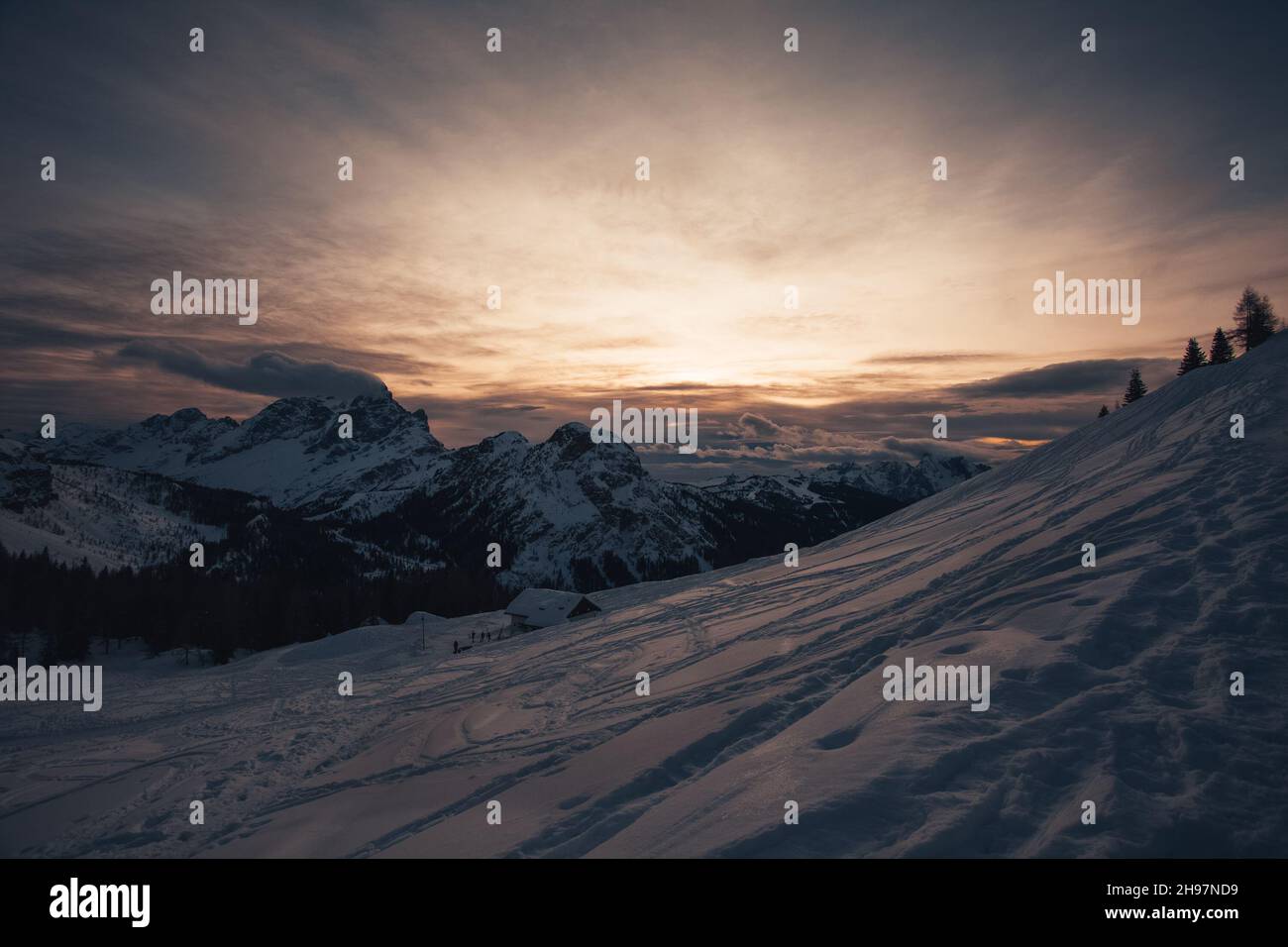 Awesome winter sunset panorama of dolomite hut and Mount Civetta ...