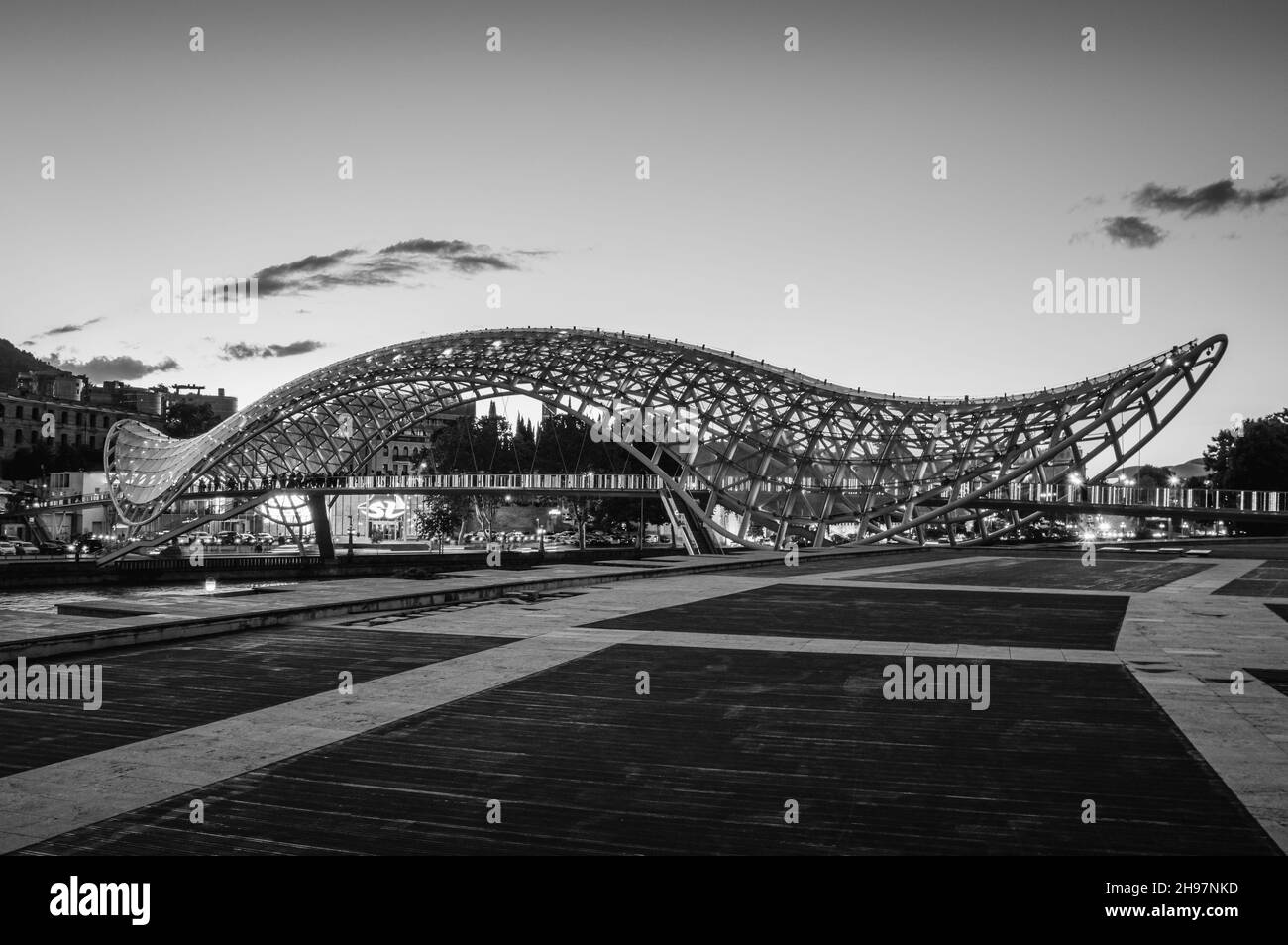 Scenic view of the glass-and-steel pedestrian Peace Bridge over the ...